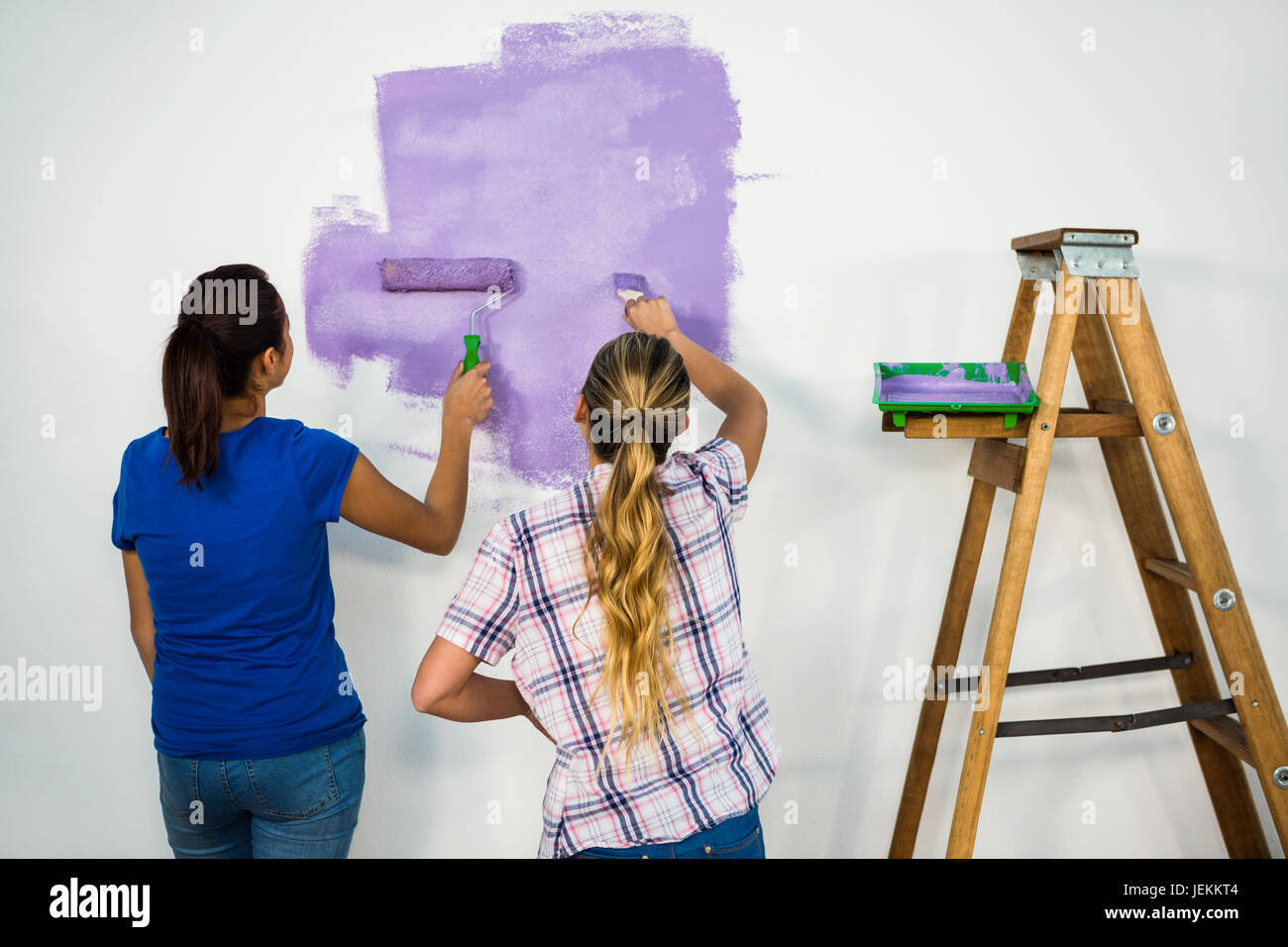 Friends together enjoying painting hi-res stock photography and images ...