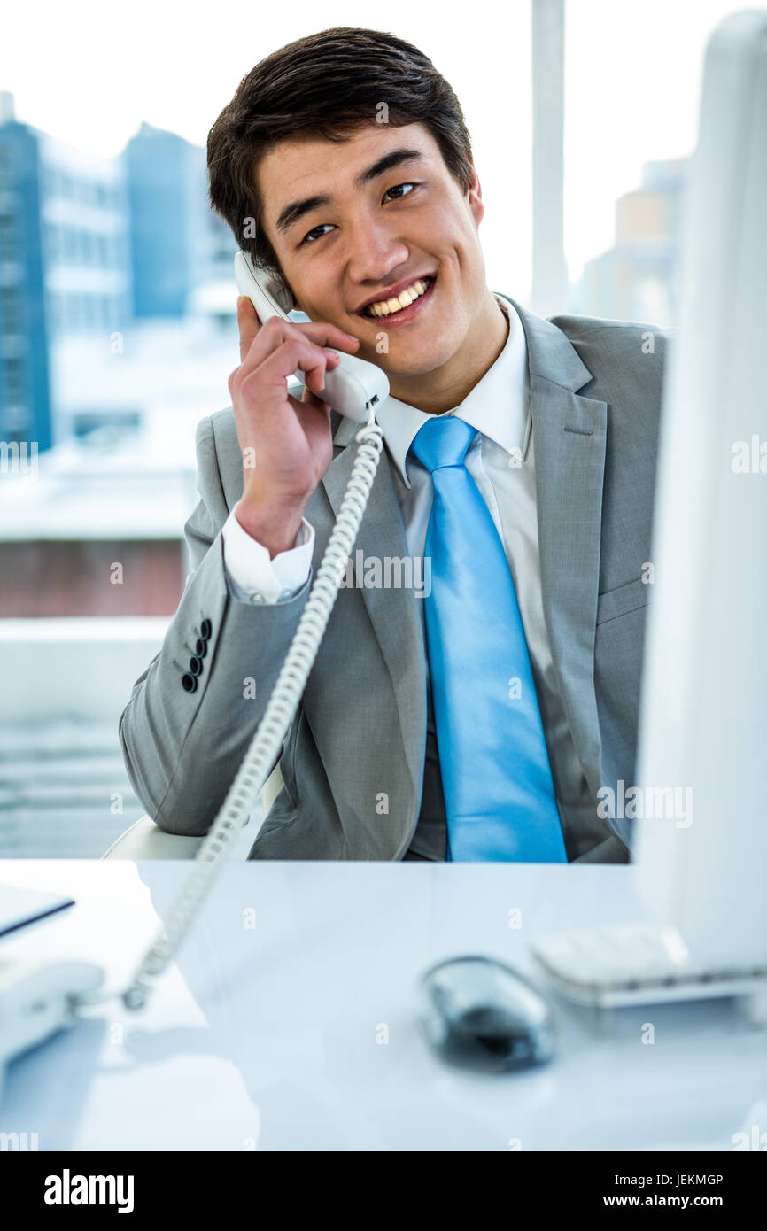 Businessman making a phone call Stock Photo - Alamy