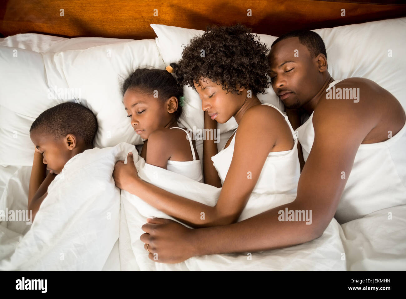 Peaceful family sleeping Stock Photo - Alamy