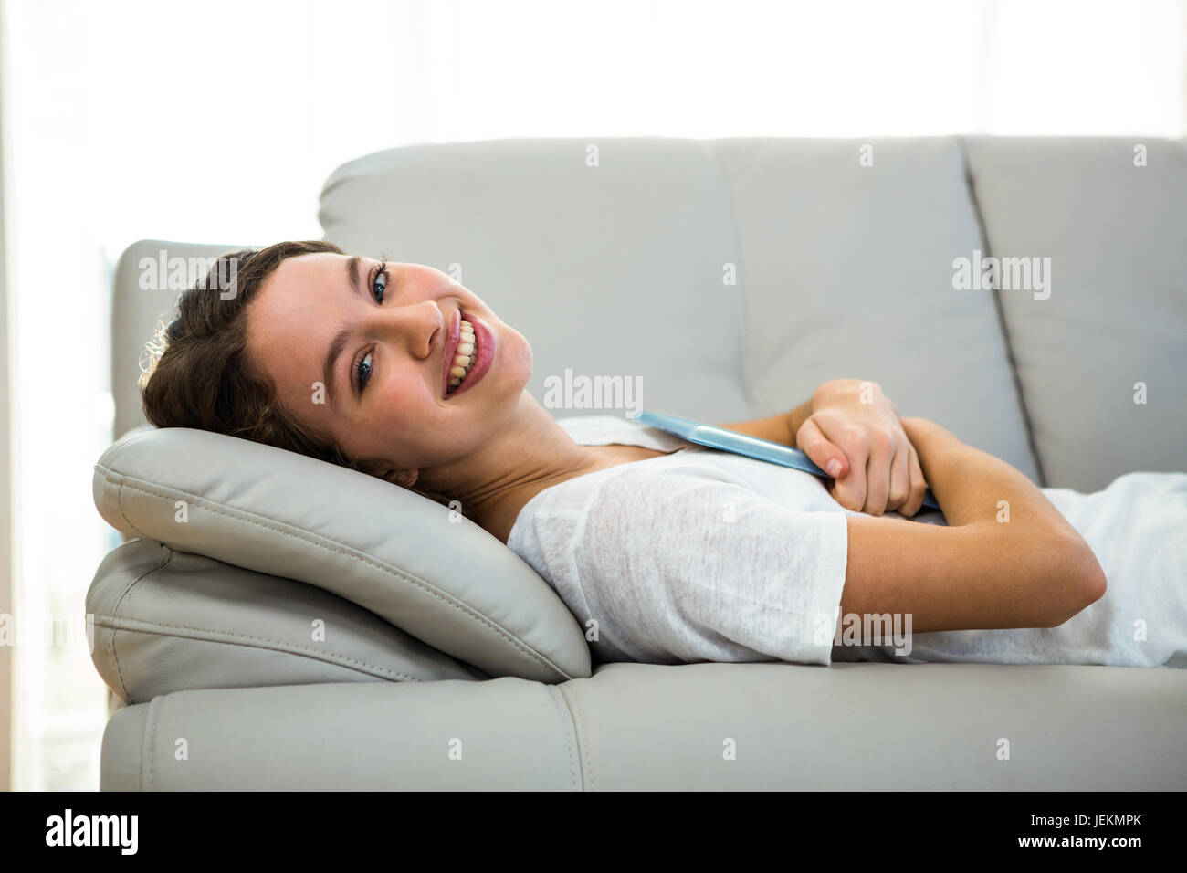 Laying on sofa hi-res stock photography and images - Alamy