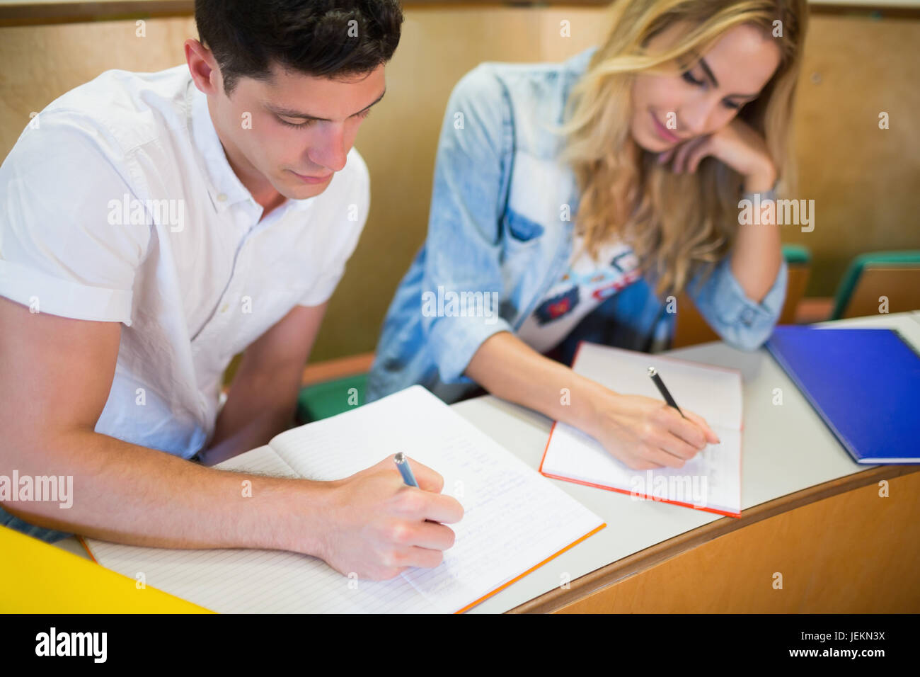 Serious students sitting examination hi-res stock photography and ...