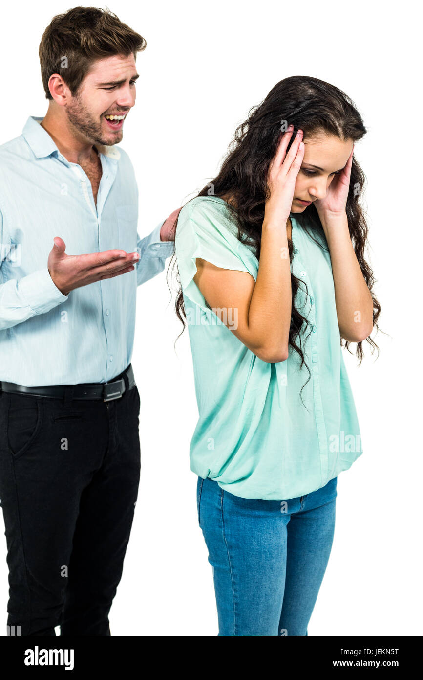 Unsmiling couple arguing Stock Photo - Alamy