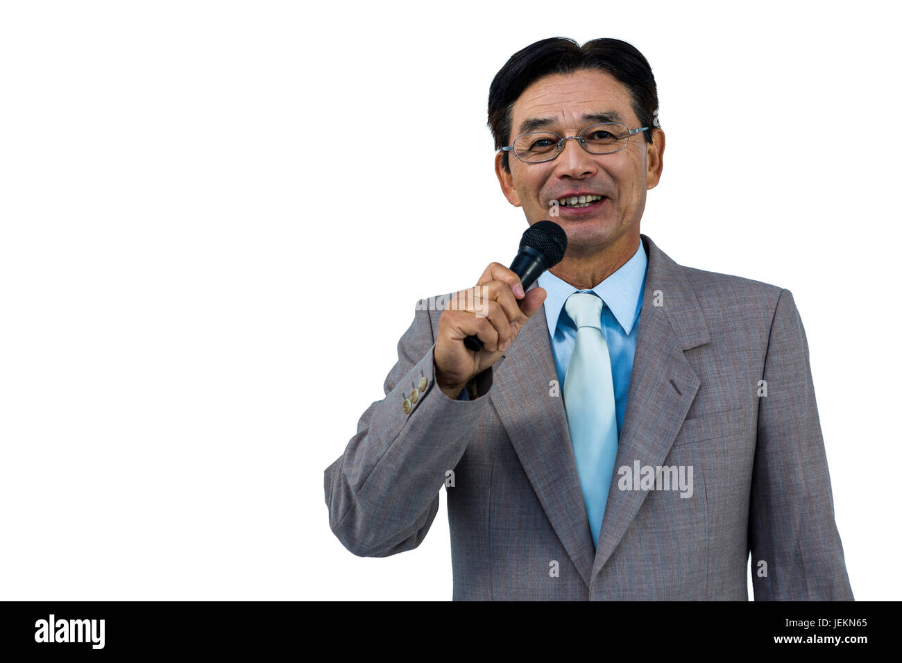 Asian businessman holding microphone Stock Photo - Alamy