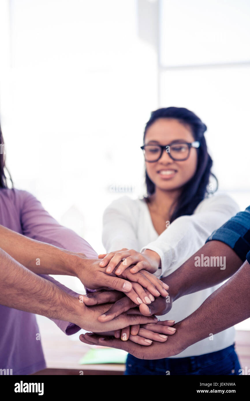 Team colleagues stacking hands hi-res stock photography and images - Alamy