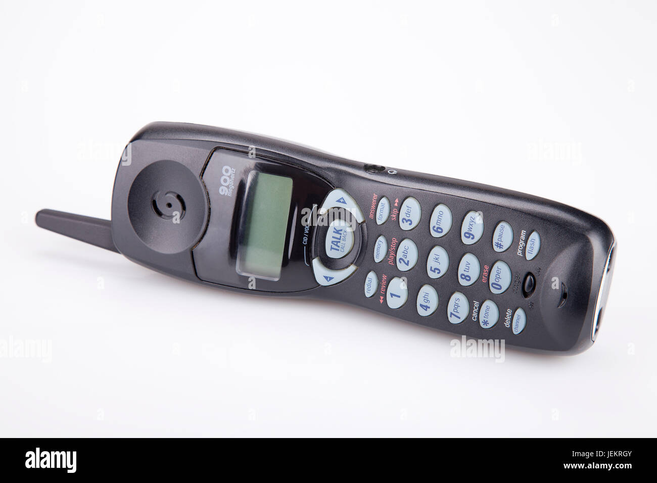Black wireless telephone on a white surface. Wireless phone isolated on ...