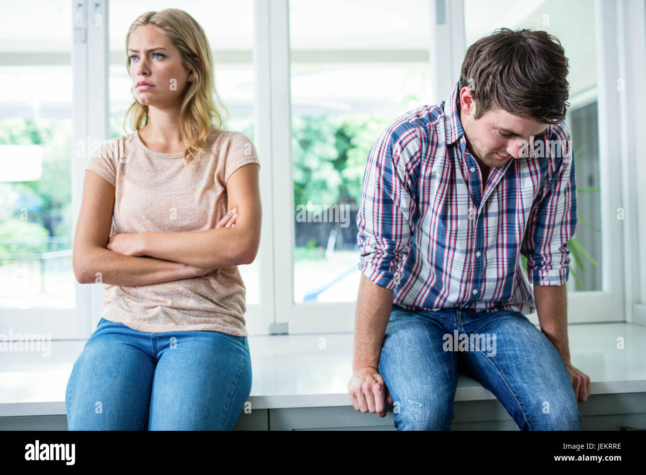 Annoyed couple ignoring each other Stock Photo - Alamy