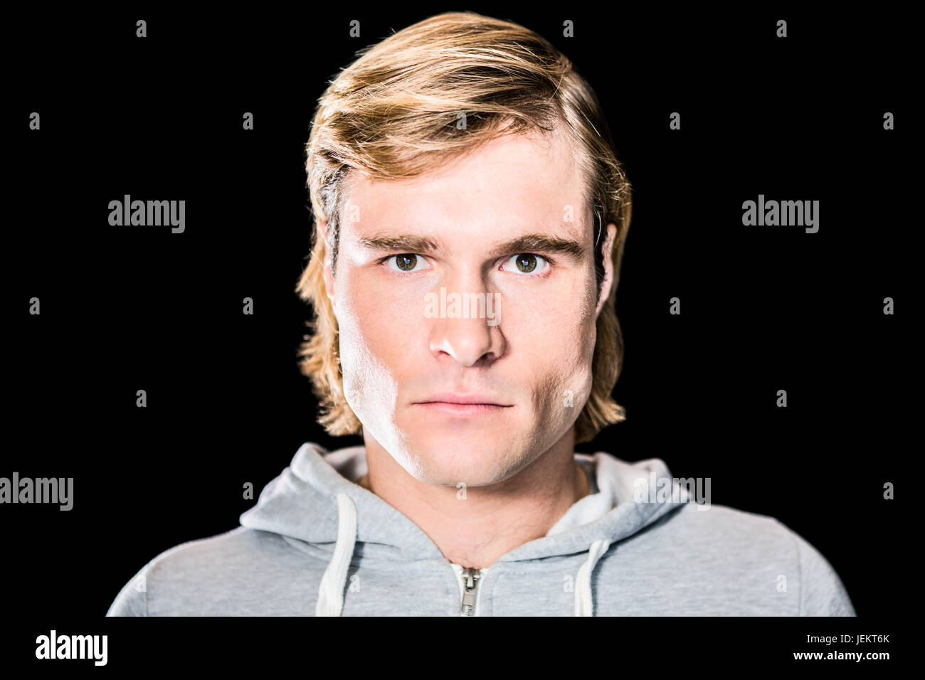 Close up of serious man staring at camera Stock Photo - Alamy
