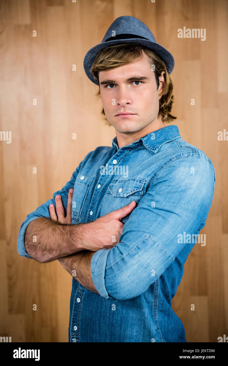 Serious man crossing arms hi-res stock photography and images - Alamy