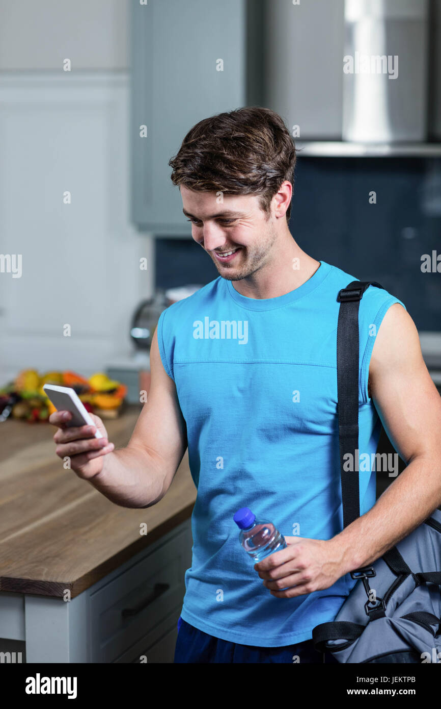 Healthy man sending text messages Stock Photo - Alamy