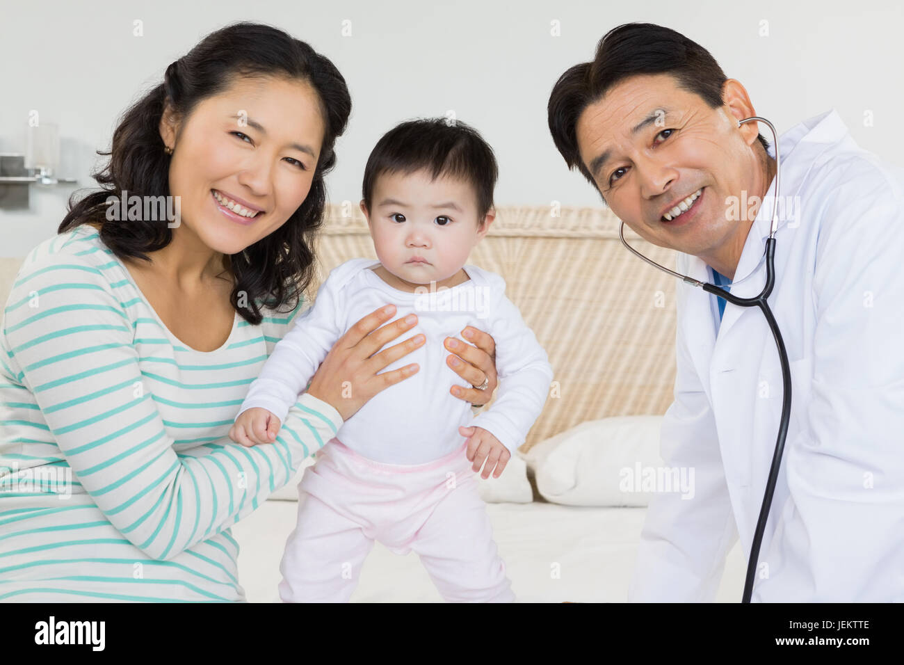Portrait of doctor, mother and baby Stock Photo - Alamy