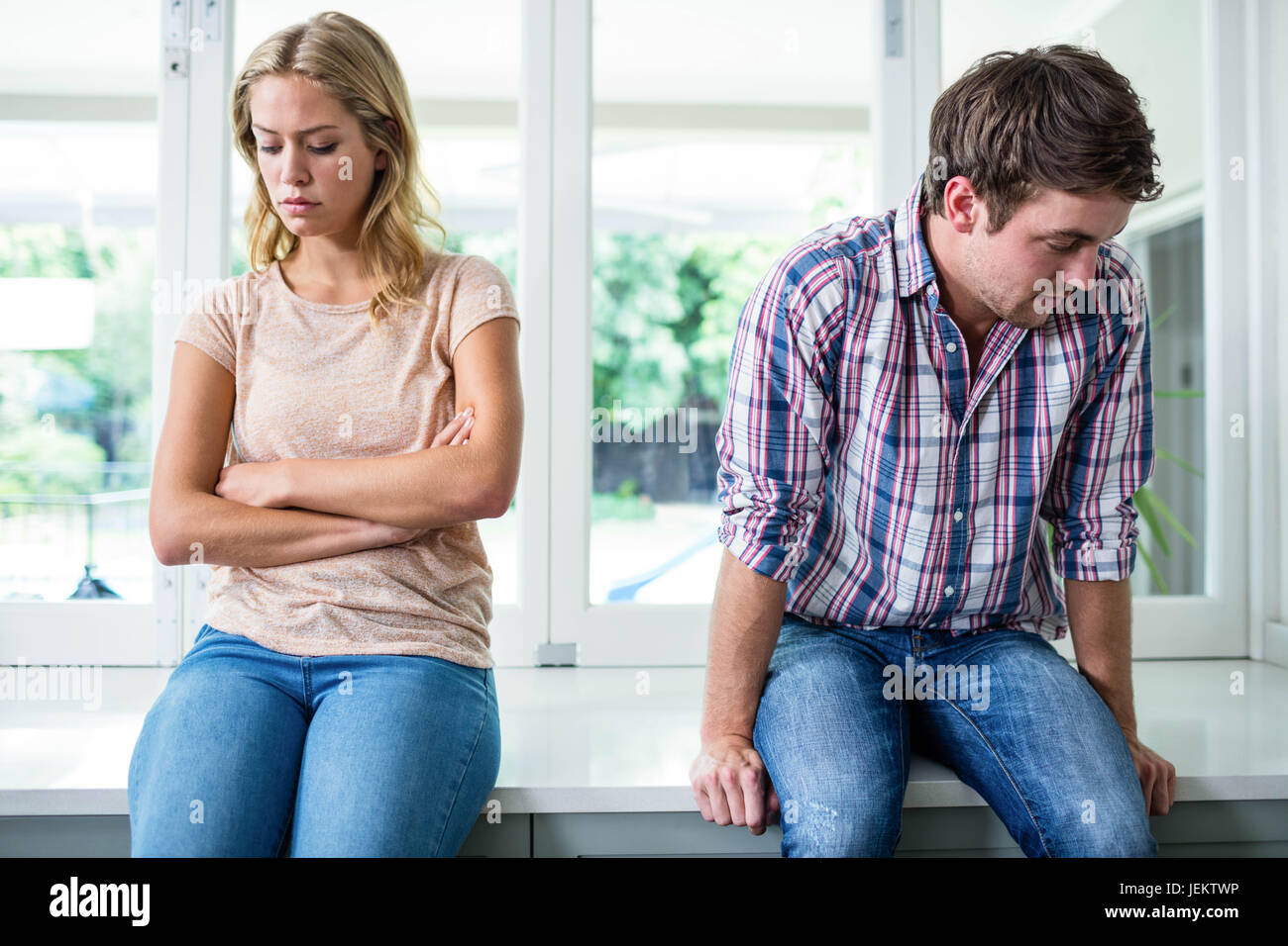 Annoyed couple ignoring each other Stock Photo - Alamy