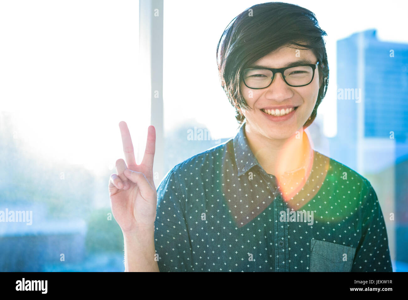 Man doing peace sign hi-res stock photography and images - Alamy