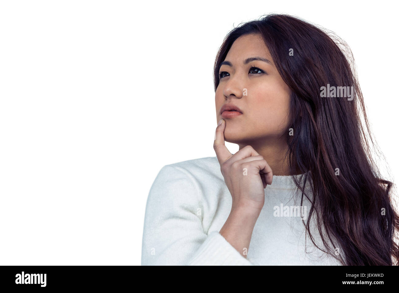 Thoughtful Asian woman with finger on chin Stock Photo - Alamy