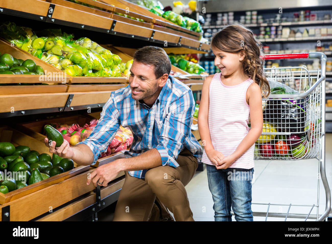 Father and daughter doing shopping Stock Photo - Alamy