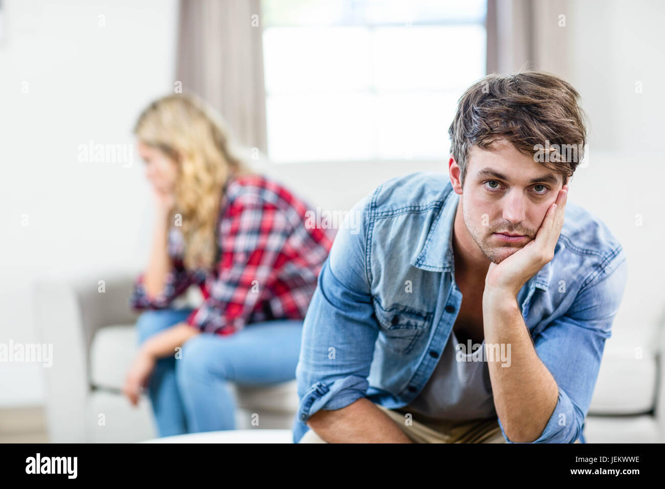 Upset couple sulking each other Stock Photo - Alamy
