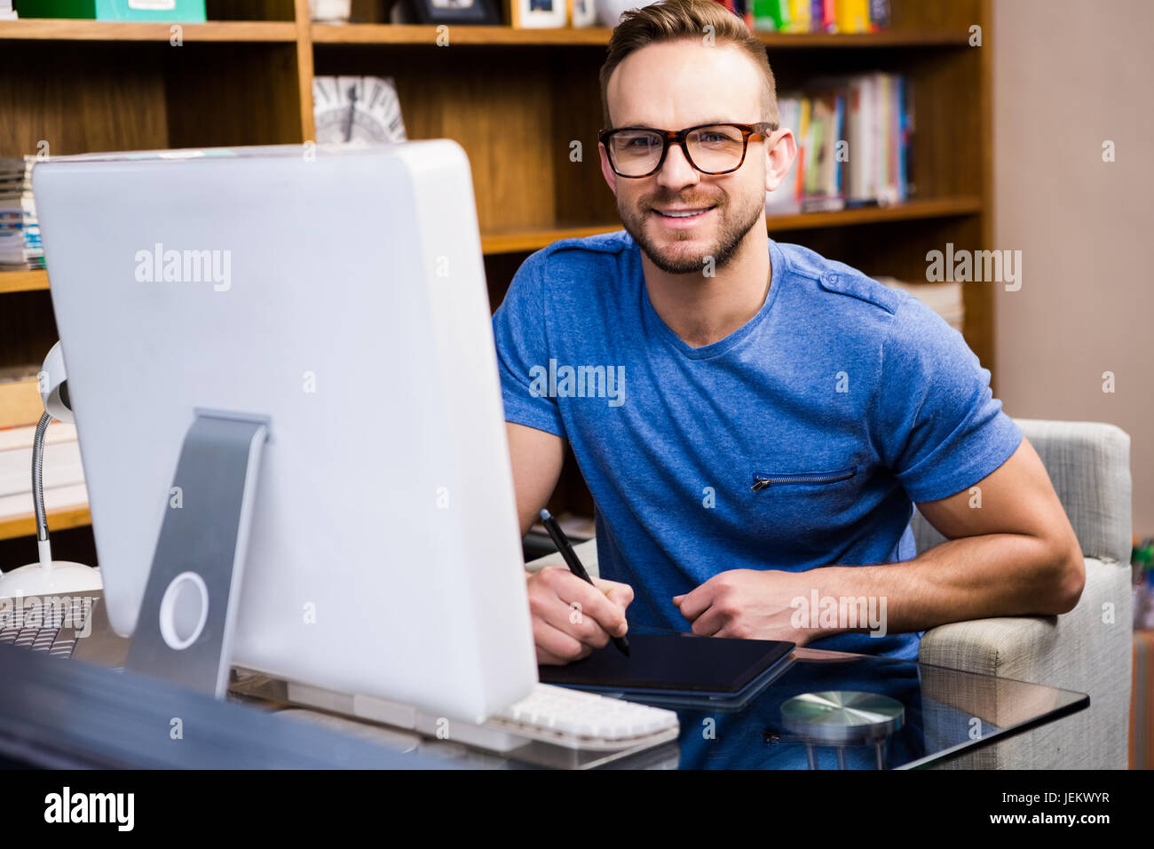 Happy male graphic designer hi-res stock photography and images - Alamy