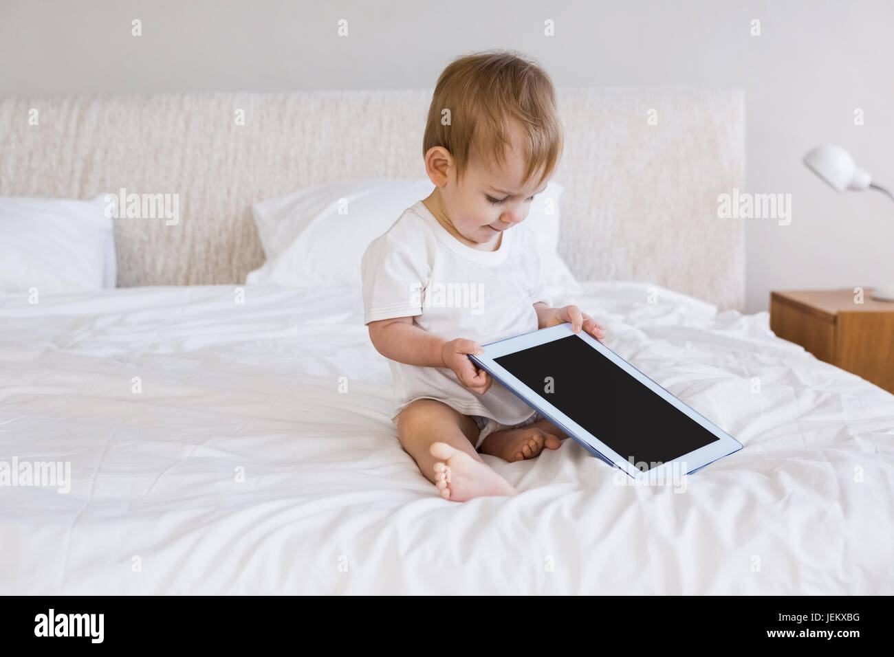 Baby concentrating hi-res stock photography and images - Alamy