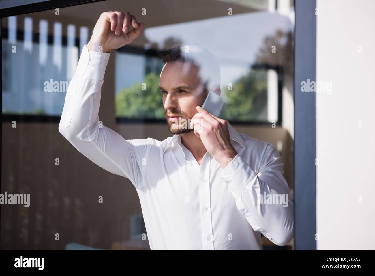 Handsome man on a phone call Stock Photo - Alamy