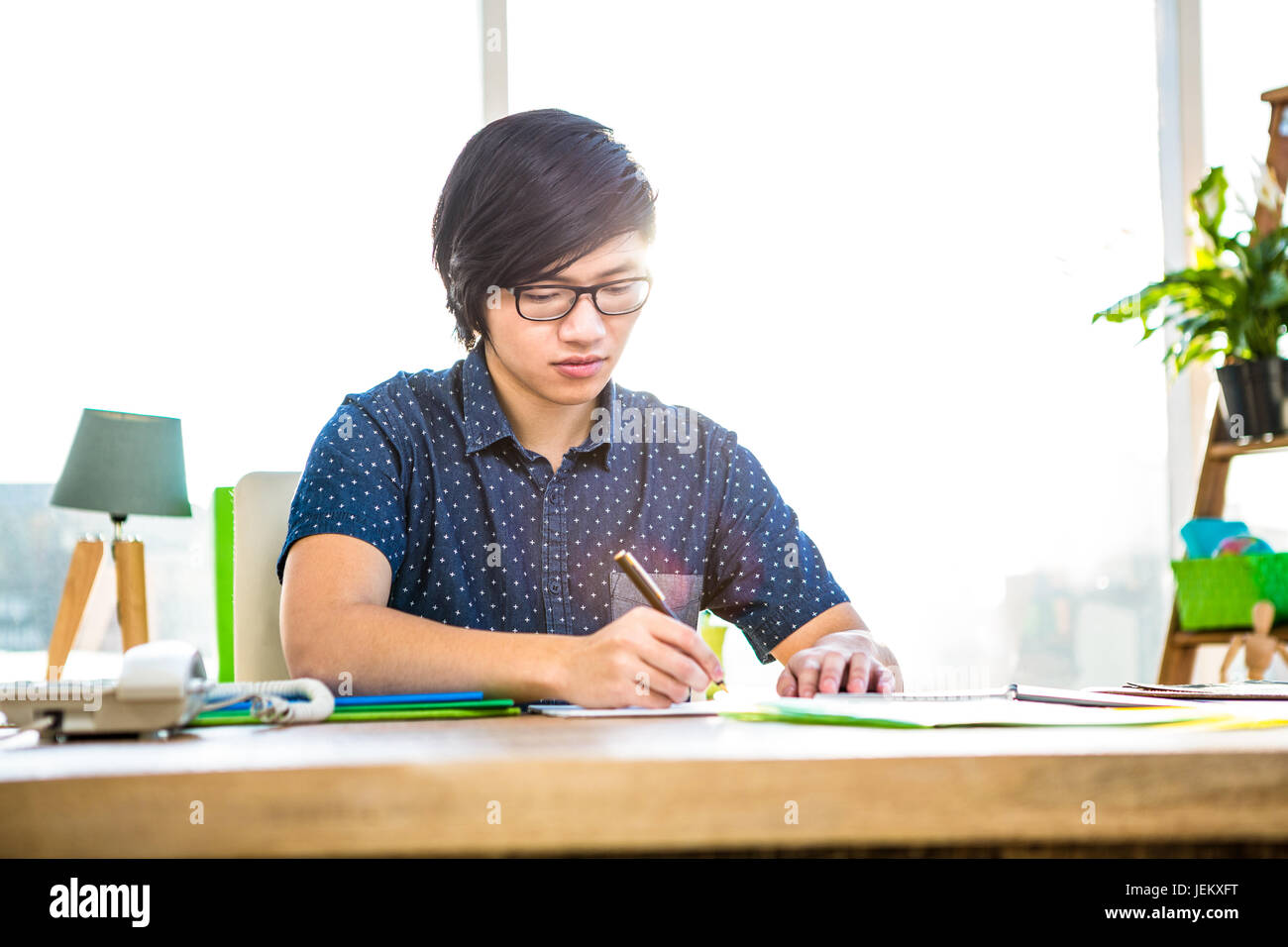 Portrait focused man writing hi-res stock photography and images - Alamy