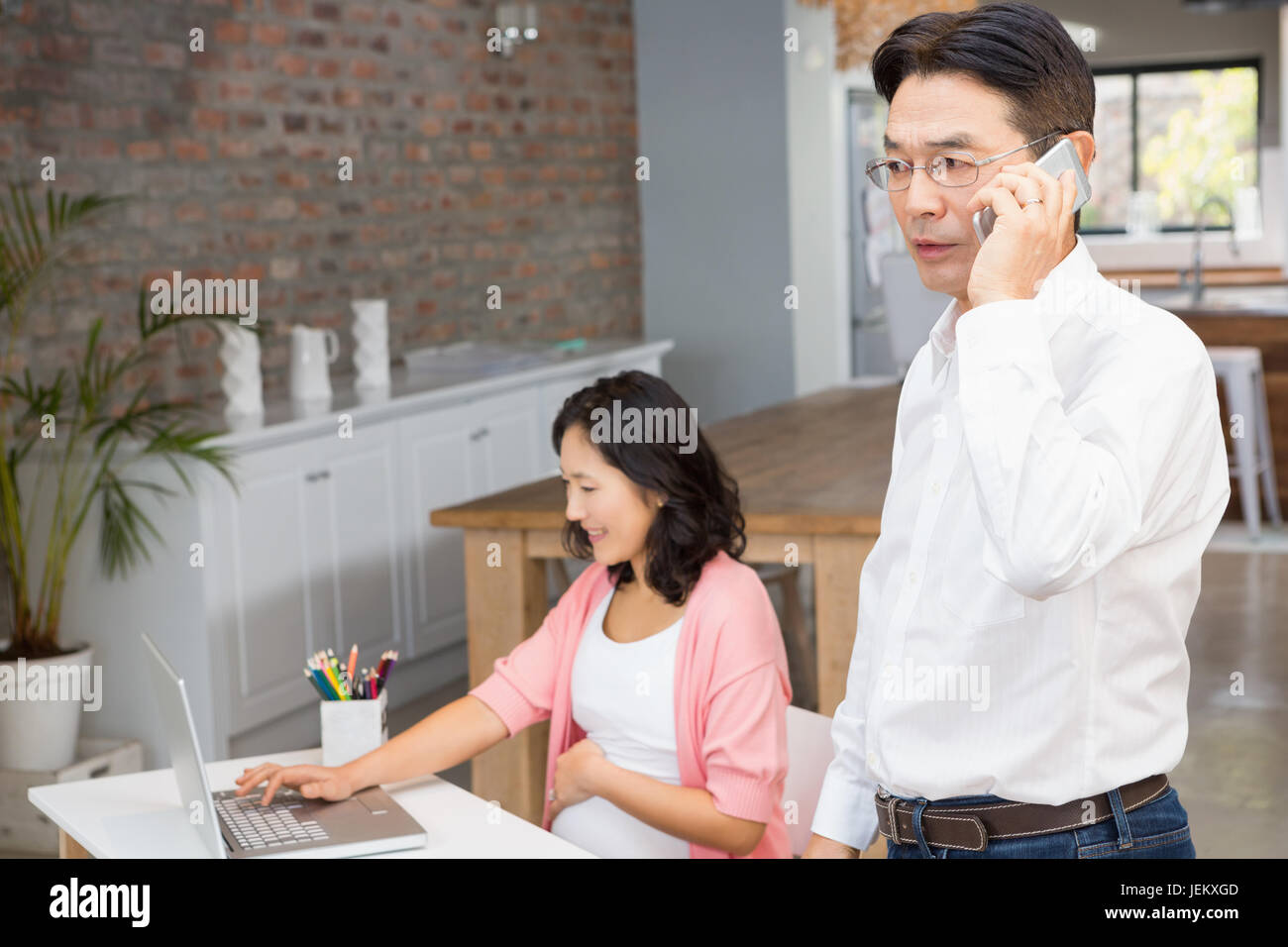Phone call at home hi-res stock photography and images - Alamy