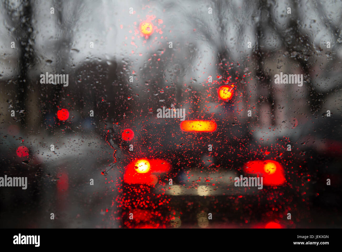 Look at the city through windscreen. Blurred foreground Stock Photo - Alamy
