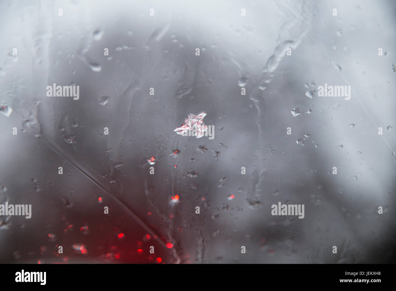 Look at the city through windscreen. Blurred foreground Stock Photo - Alamy