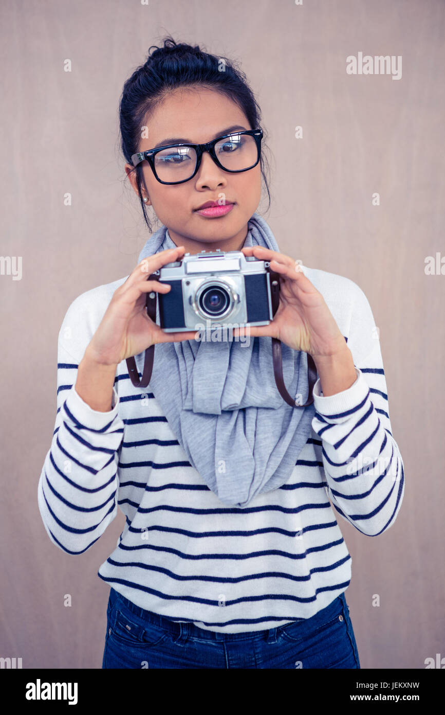 Asian woman holding camera hi-res stock photography and images - Alamy