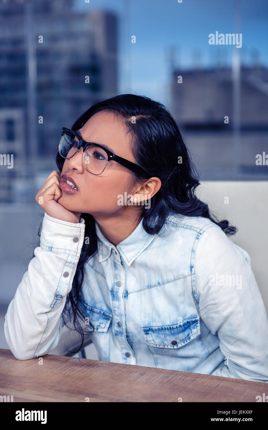 Confused asian business woman holding hi-res stock photography and ...