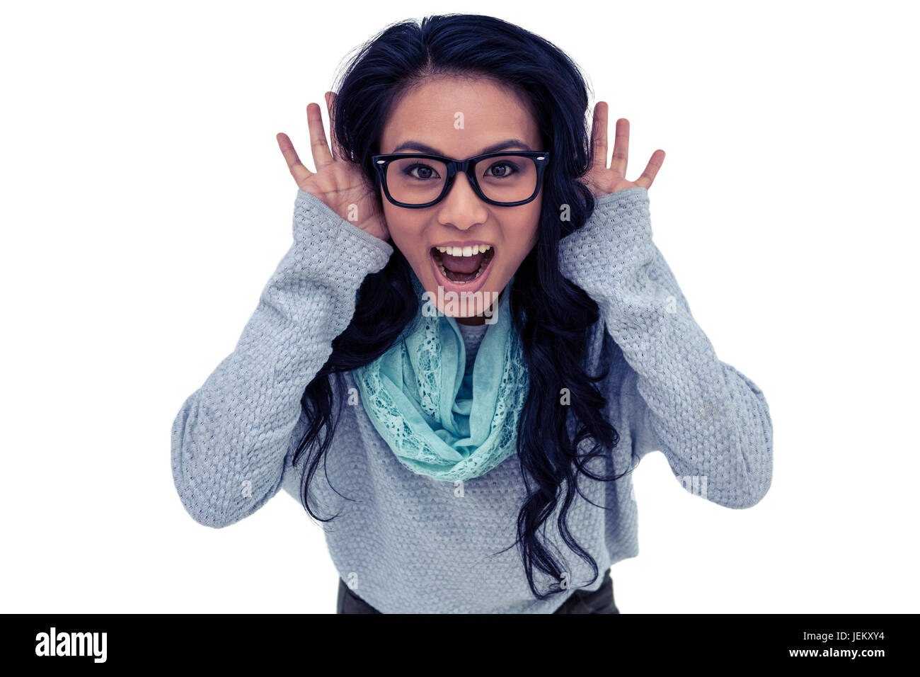 Asian woman shouting to the camera Stock Photo - Alamy