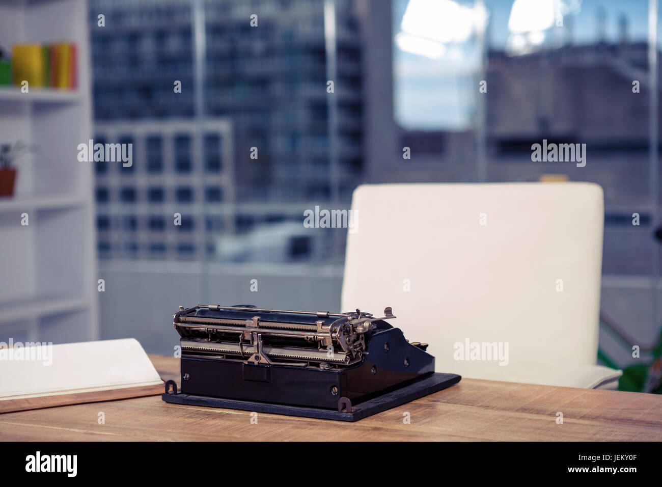 Typewriter on desk Stock Photo - Alamy