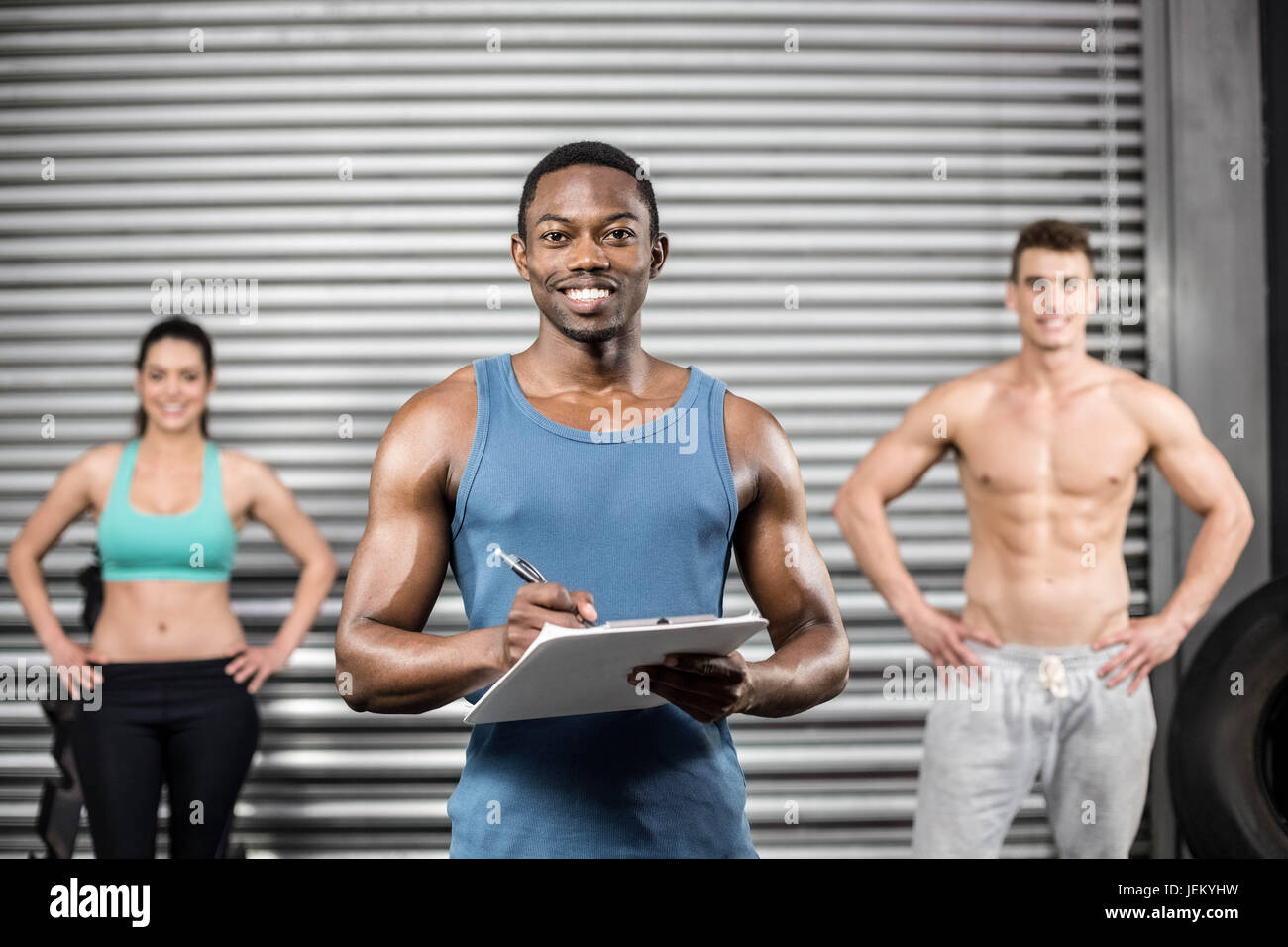 Fit people smiling at the camera Stock Photo - Alamy