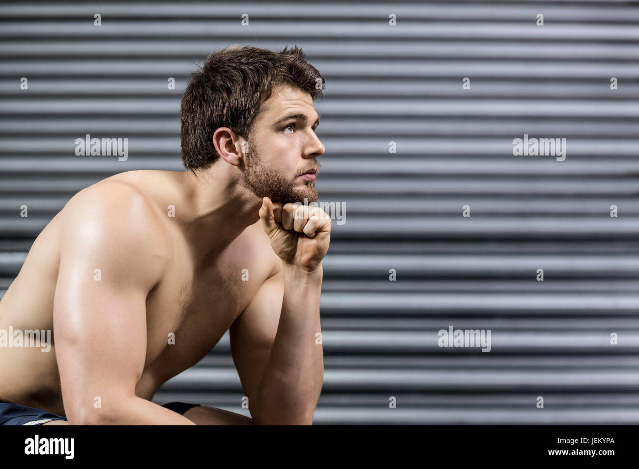 Thoughtful man looking up Stock Photo - Alamy