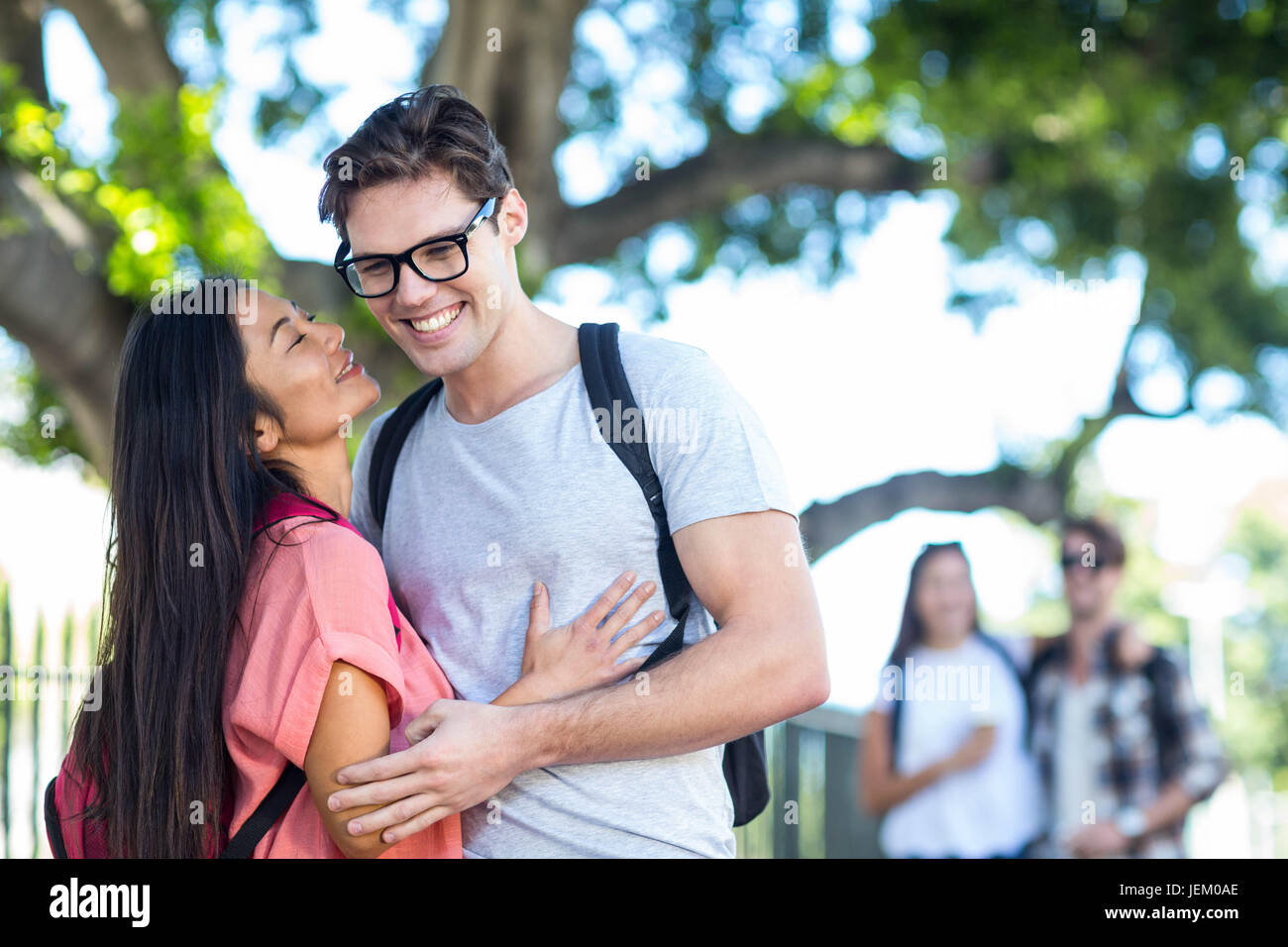 Hip young couple kiss hi-res stock photography and images - Alamy