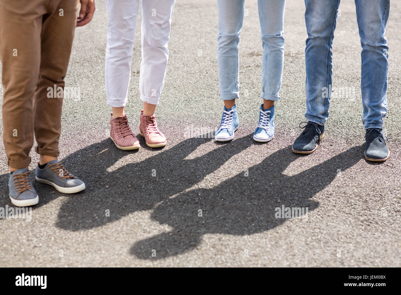 Lower section of friends Stock Photo - Alamy