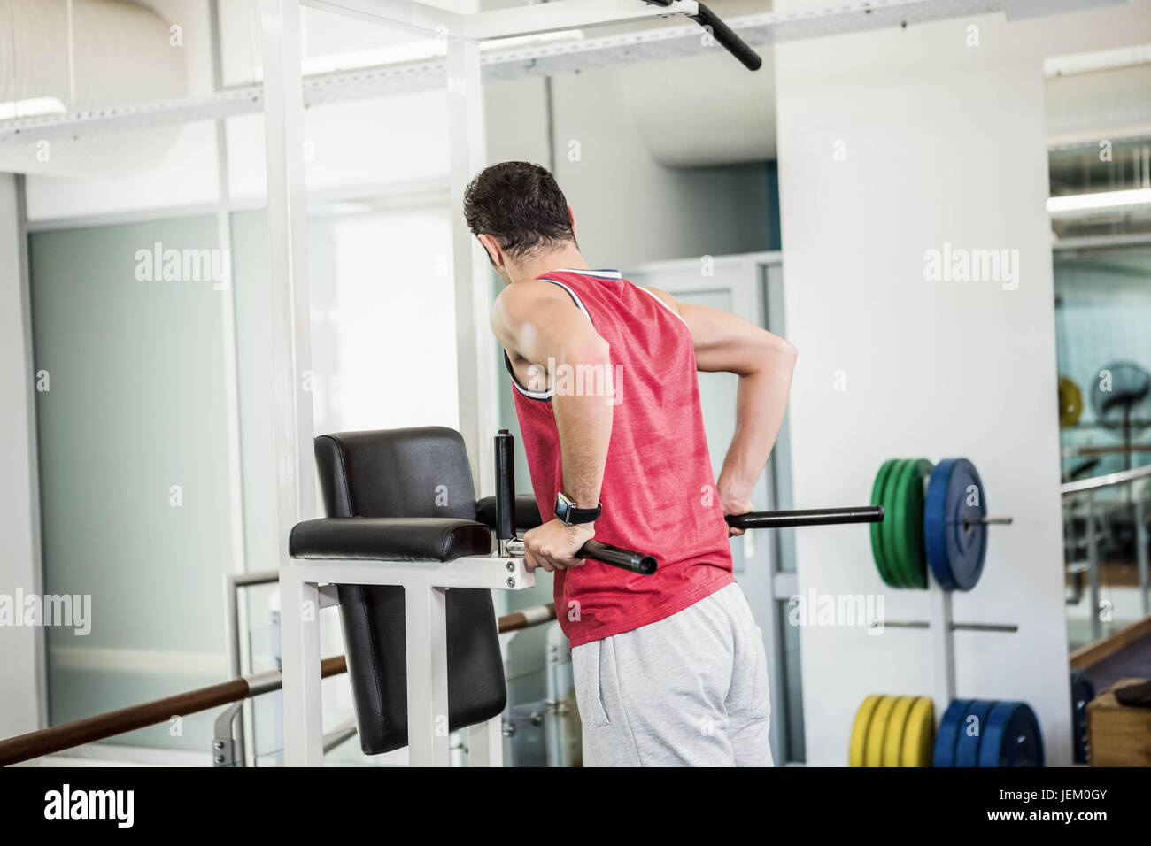 Muscular man doing pull up Stock Photo - Alamy