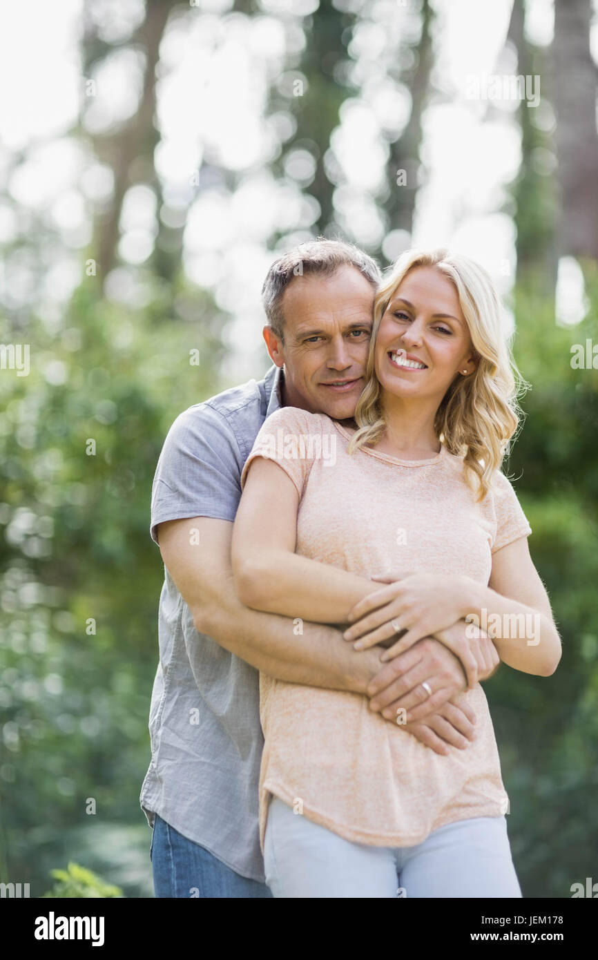 Cute couple hugging Stock Photo - Alamy