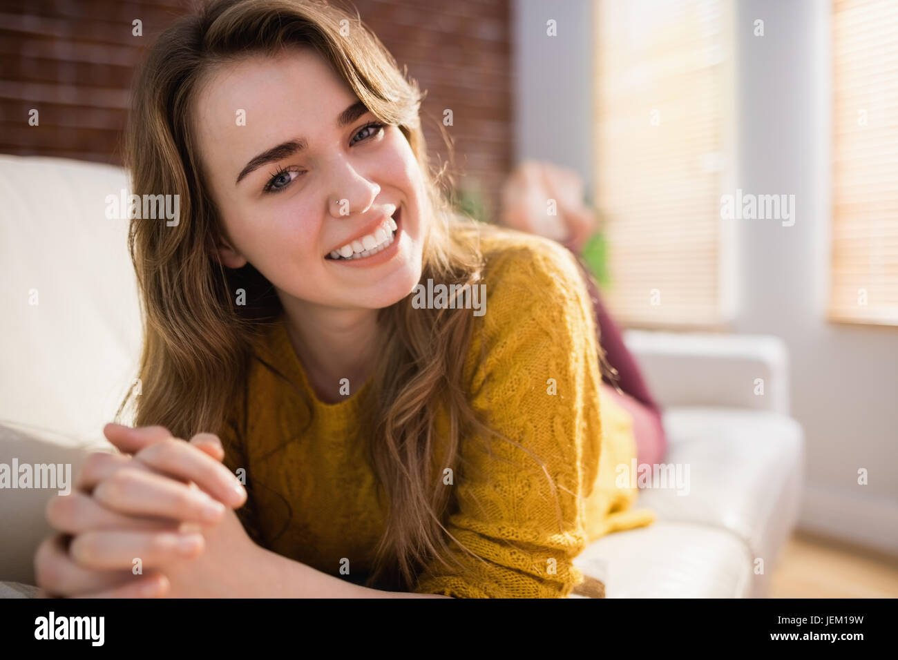 Pretty woman lying on hi-res stock photography and images - Alamy