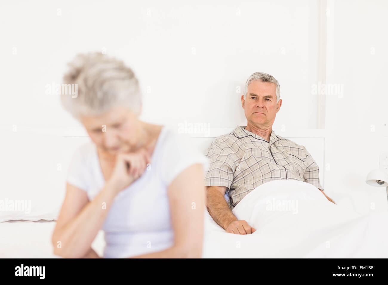Annoyed couple ignoring each other Stock Photo - Alamy