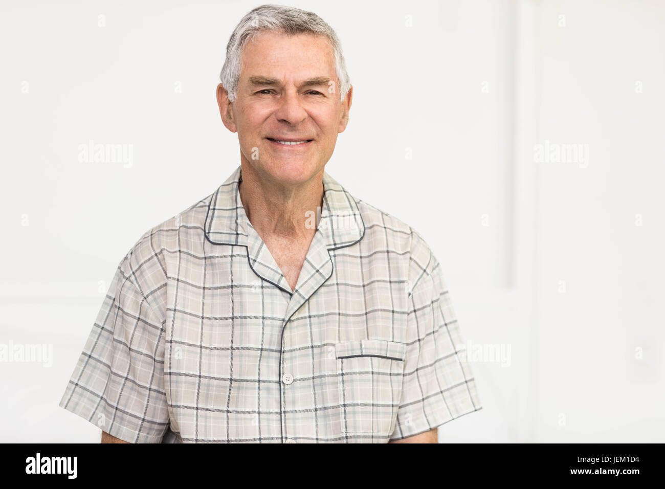 Peaceful senior man smiling Stock Photo - Alamy