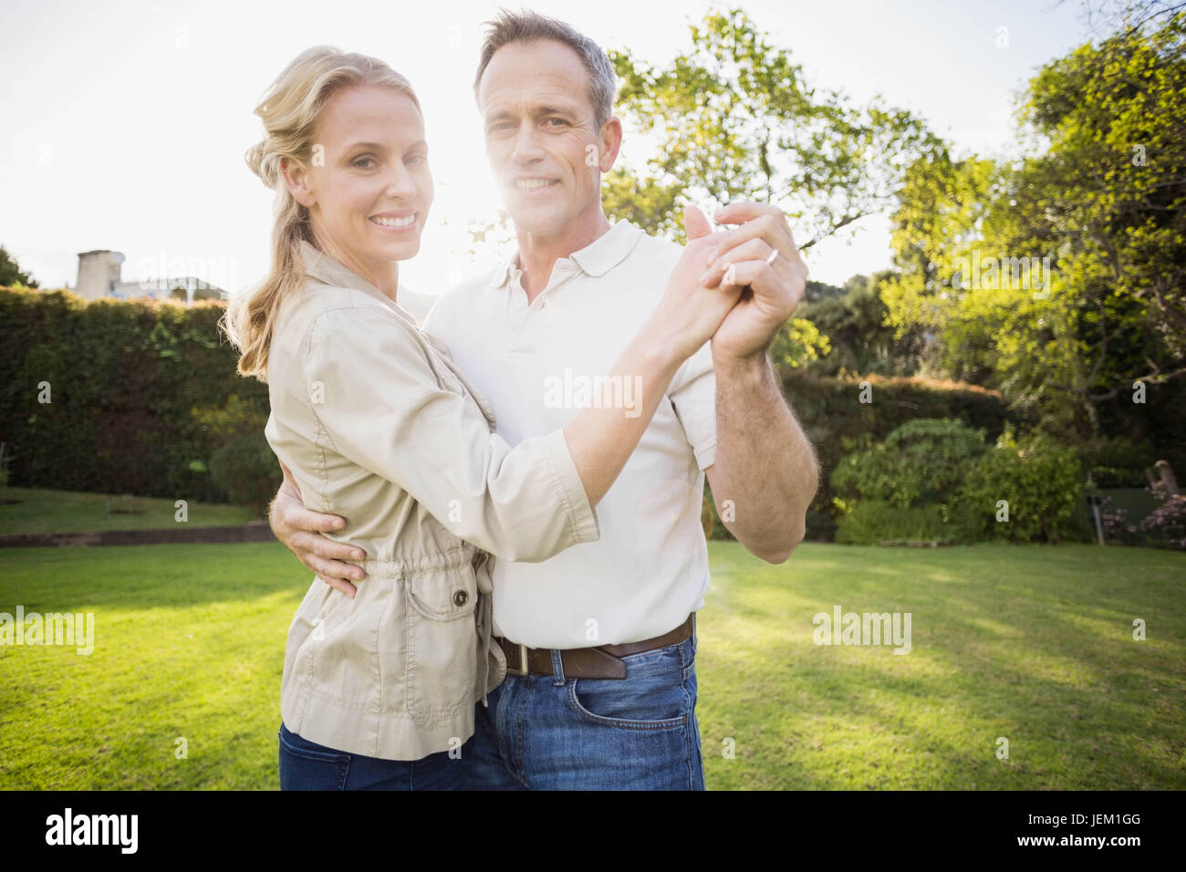 Cute couple dancing Stock Photo - Alamy