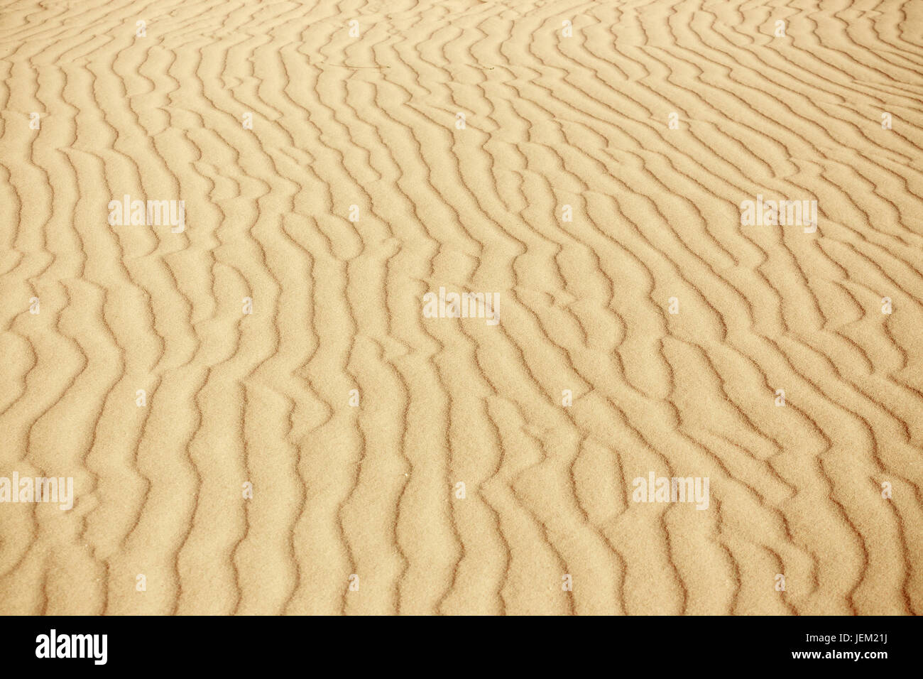 Lines in the sand of a beach, close up Stock Photo - Alamy