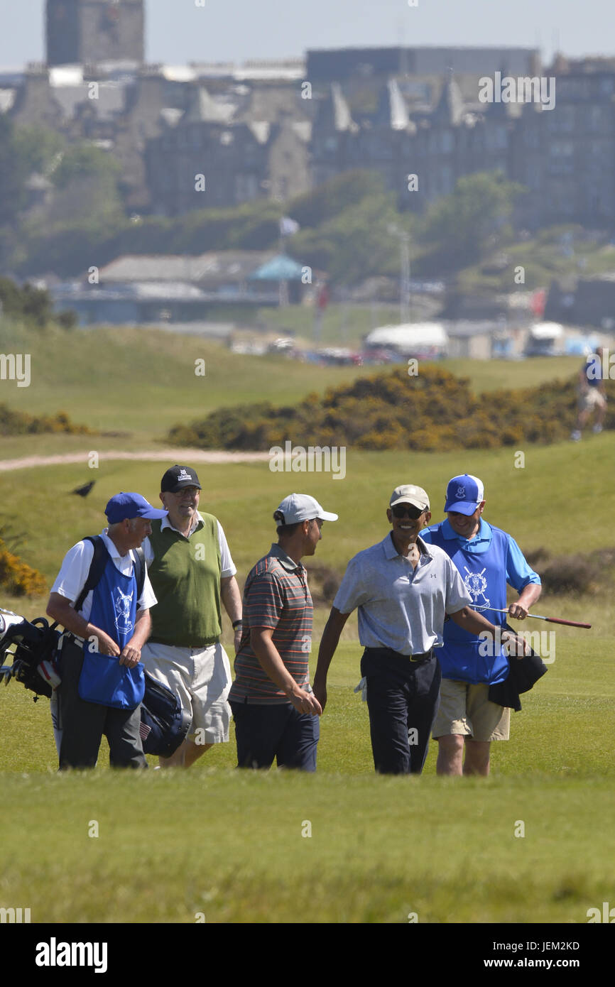 Former US president Barack Obama (light blue shirt) playing a round of ...