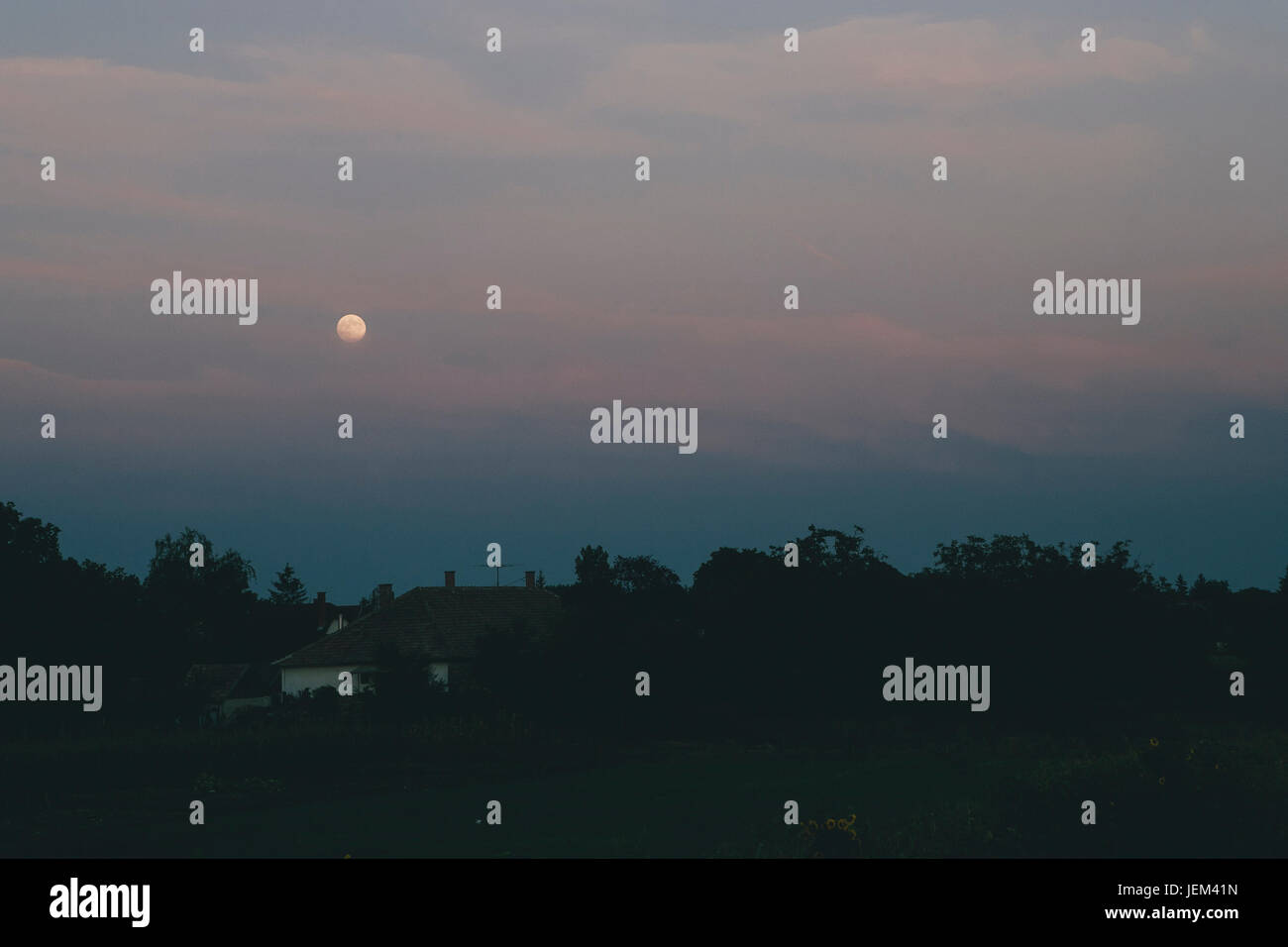 Moonlight over village hi-res stock photography and images - Alamy