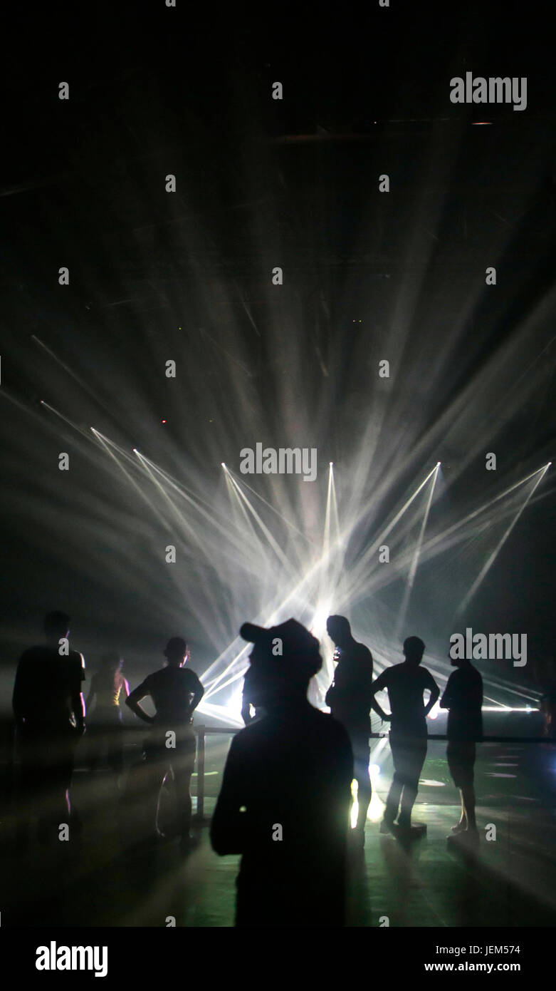 People watching a light spectacle by Daito Manabe Stock Photo - Alamy