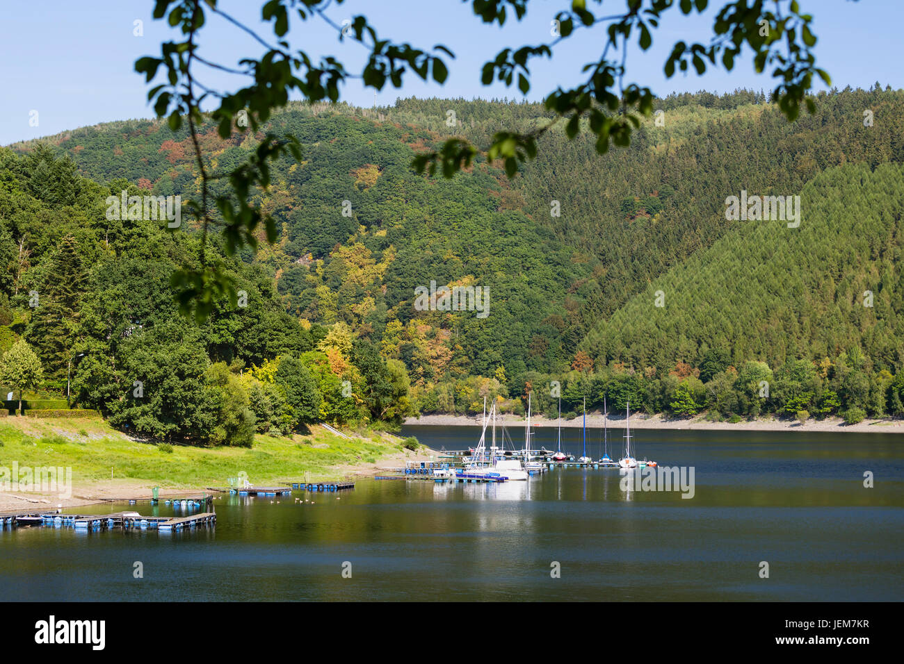 A small Lake Rursee marina in Rurberg in the Eifel, Germany on a summer ...