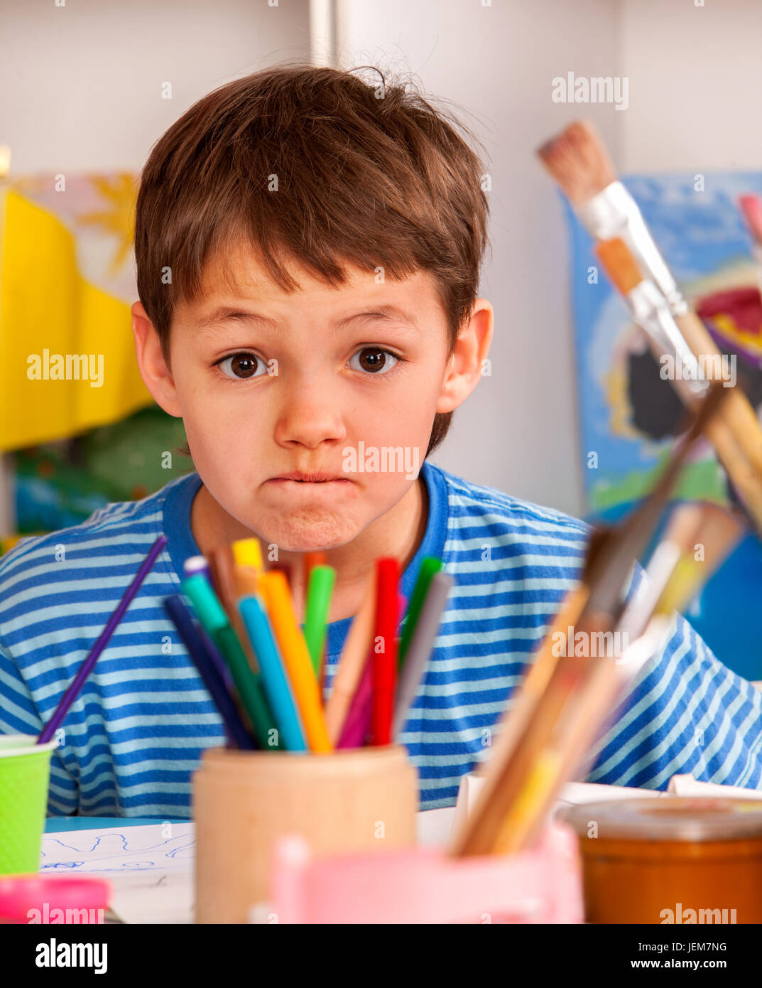 Small students boy painting in art school class Stock Photo - Alamy