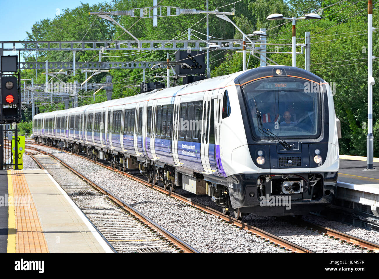 Crossrail train class 345 on Elizabeth Line on passenger all station service arriving at new ...