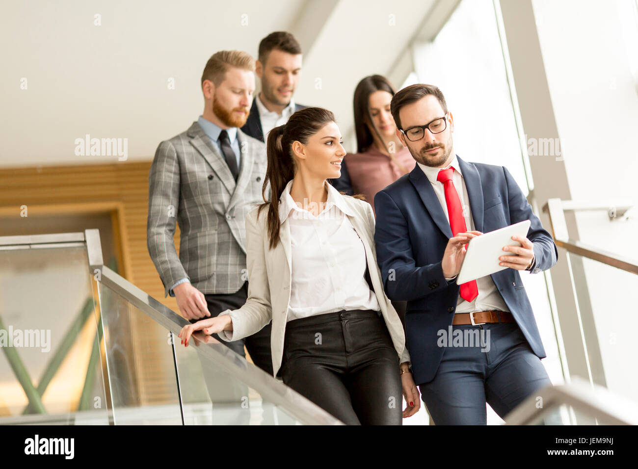 Business people on stairs hi-res stock photography and images - Alamy