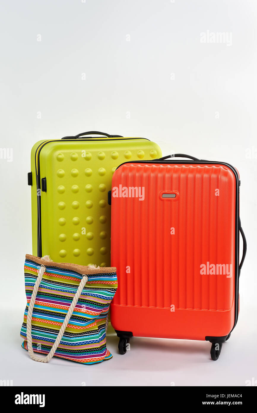 Summer time suitcases, white background. Woman colorful handbag, bright ...