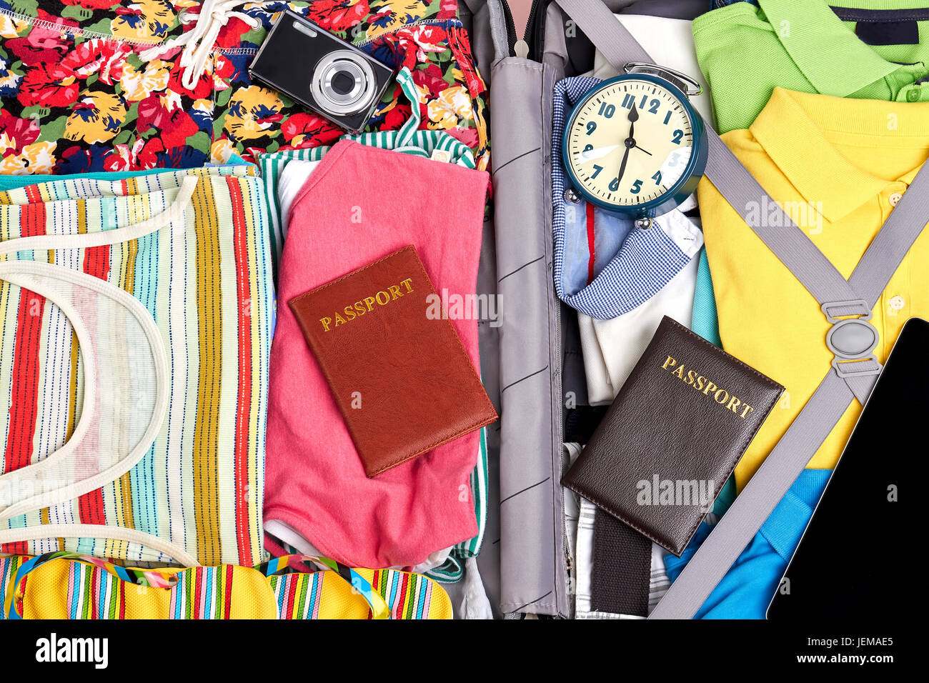 Close up of packed suitcase. Clothes and important things for tour ...